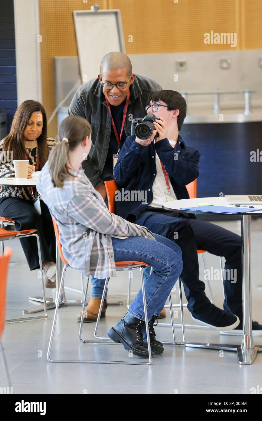 Disabled students taking photos at university Stock Photo - Alamy