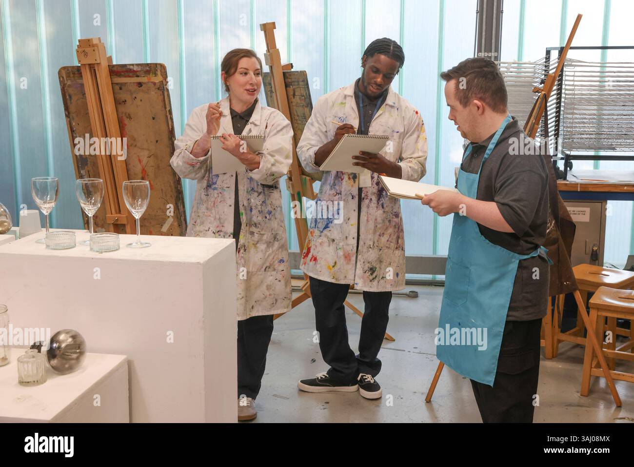 Disabled people drawing at workshop Stock Photo - Alamy