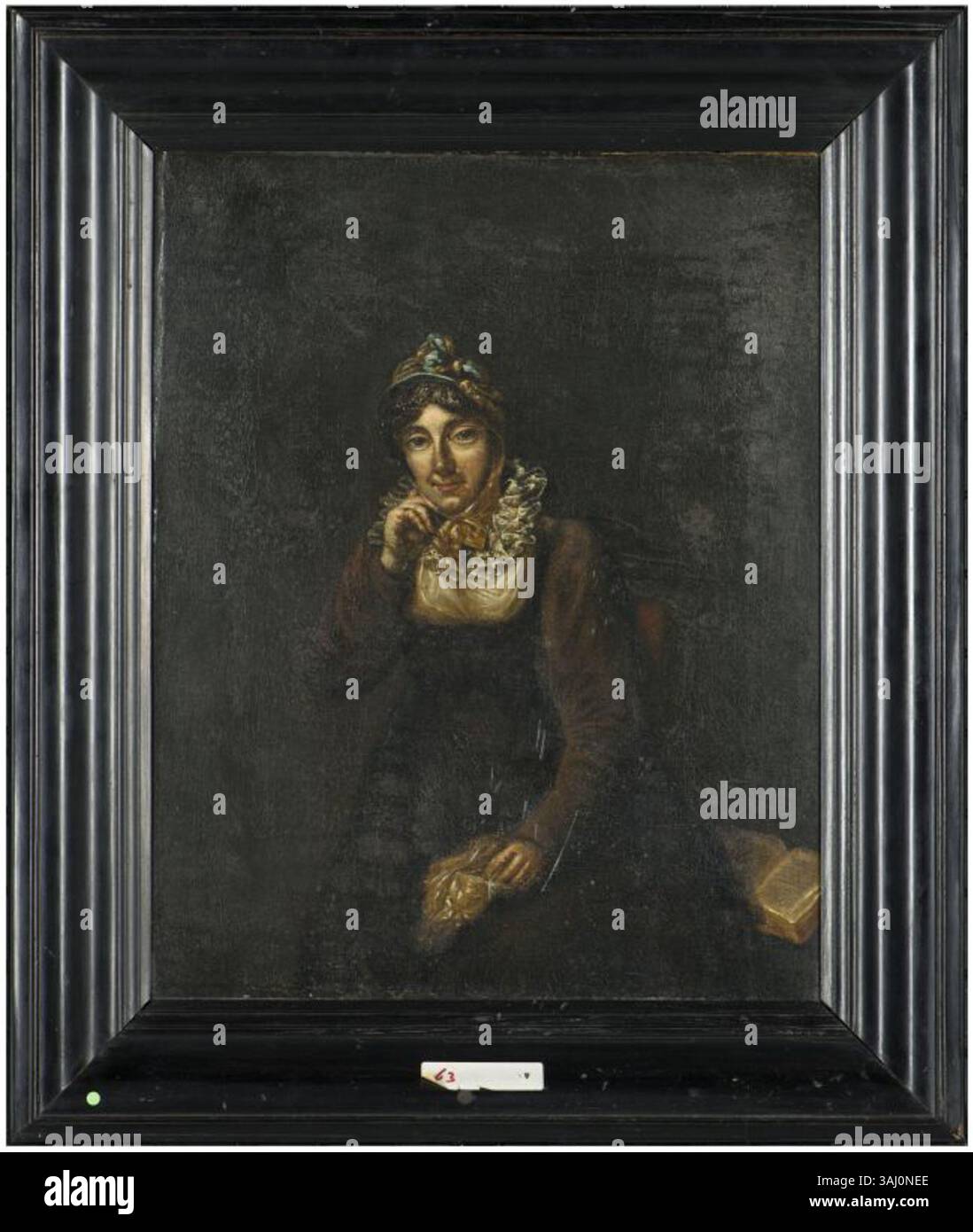 This 1799 oil on canvas painting shows a seated woman with a book. The ...