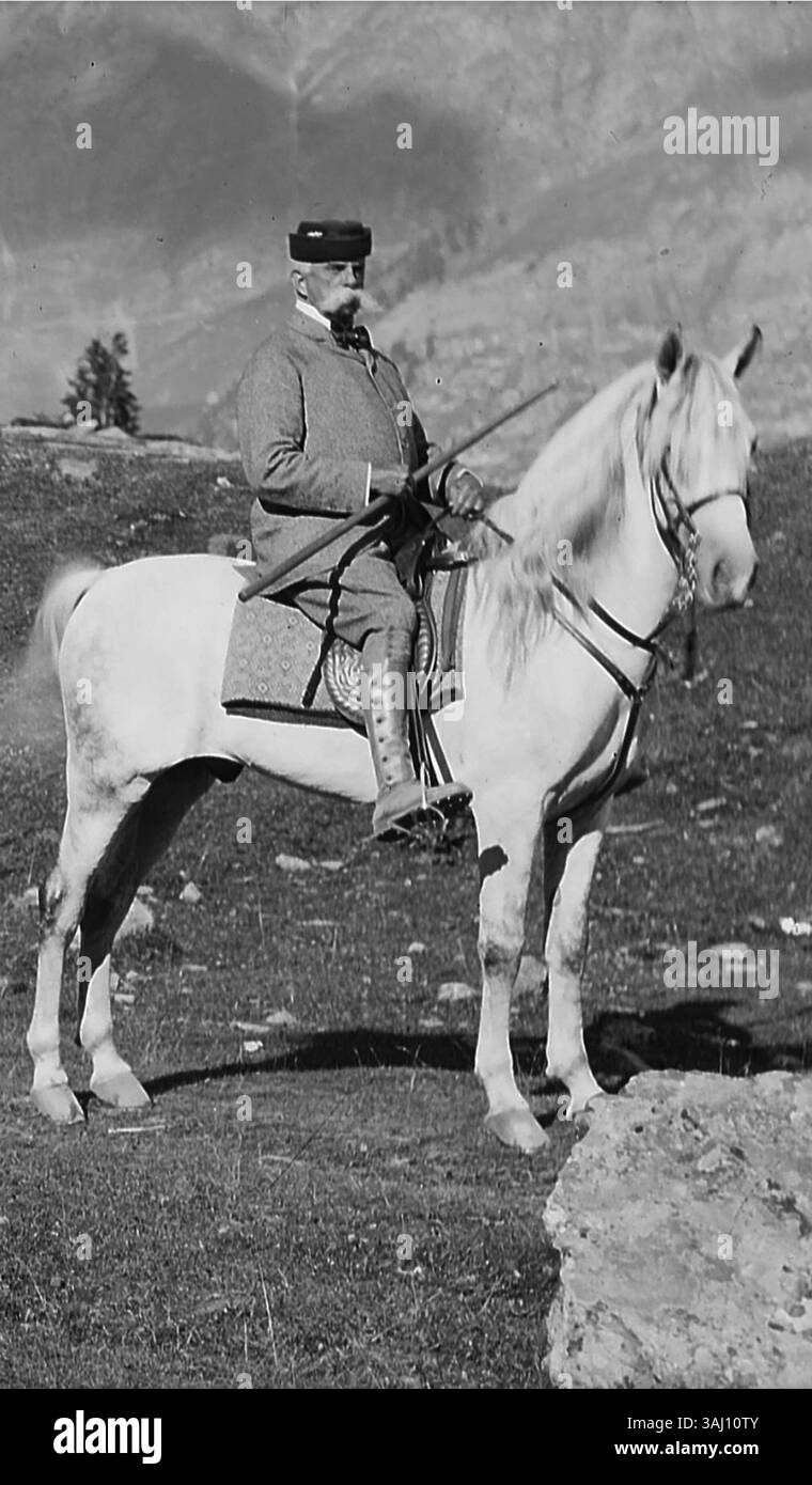 This 1899 photograph shows King Umberto I of Italy on horseback during ...