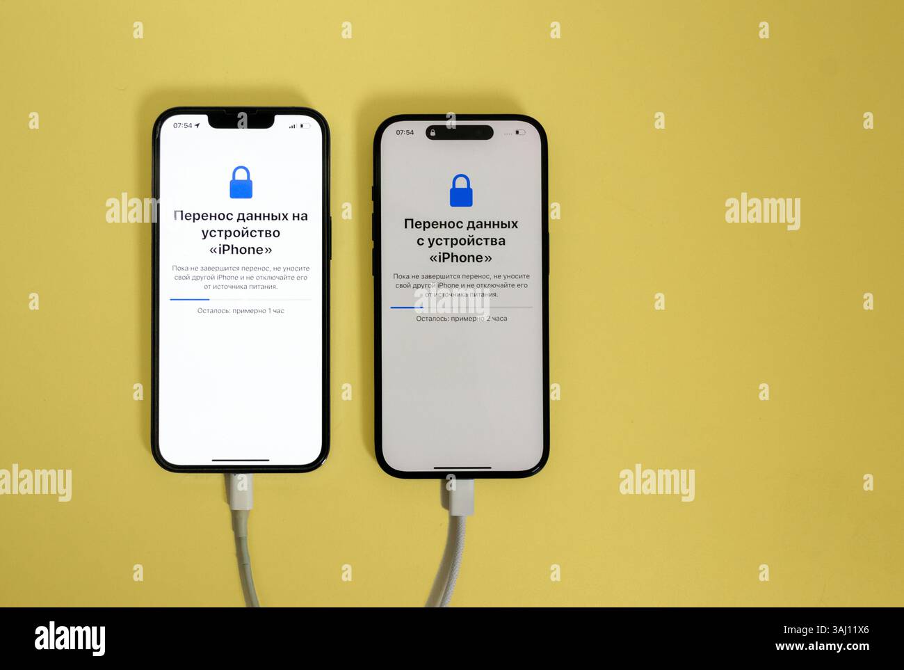 Ljubljana, Slovenia- May, 2024: Data transfer between two iPhones ...
