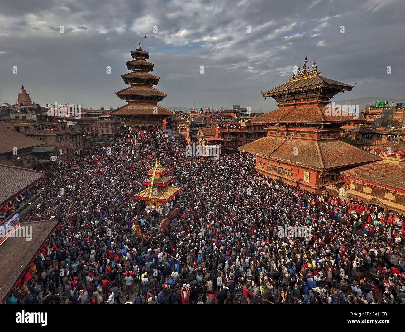 April 10, 2025: Nepali people gather to observe the pulling of the ...