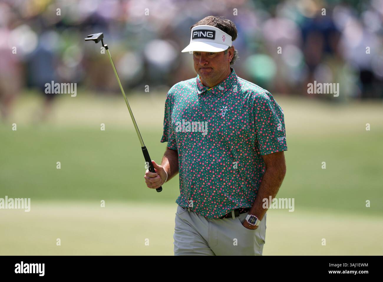 Bubba Watson waves after making a putt on the sixth hole during the ...