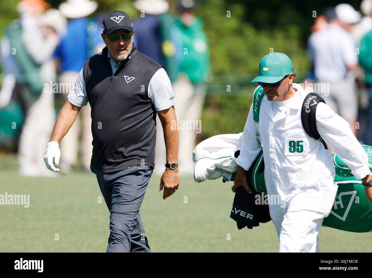 Augusta, United States. 10th Apr, 2025. Phil Mickelson and his caddie ...