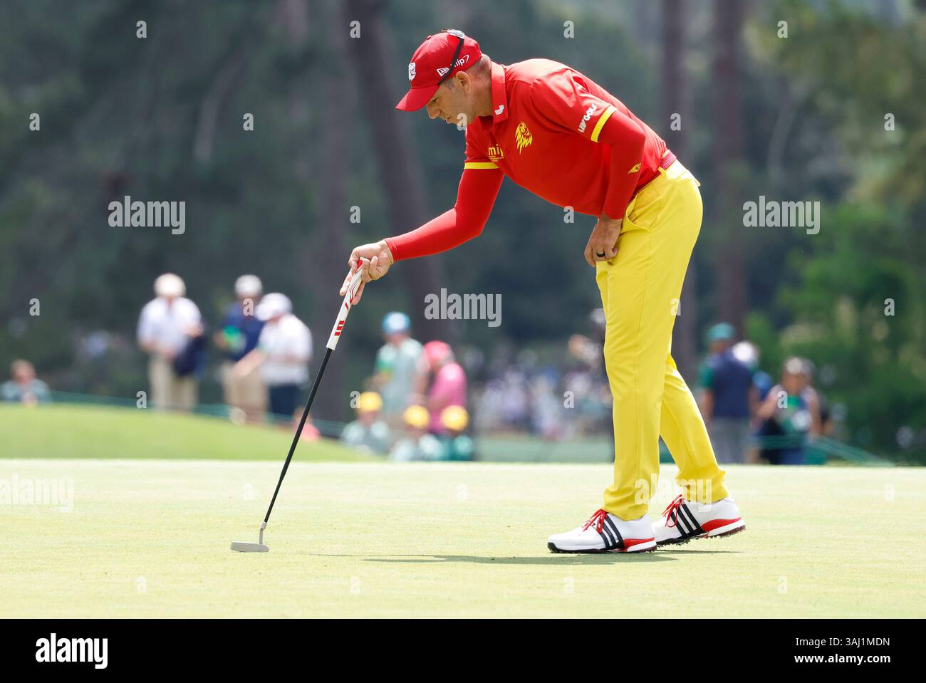 Sergio Garcia of Spain prepares to putt on the third hole during the ...