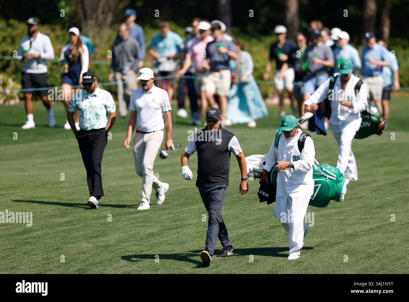 Augusta, United States. 10th Apr, 2025. Phil Mickelson and his caddie ...