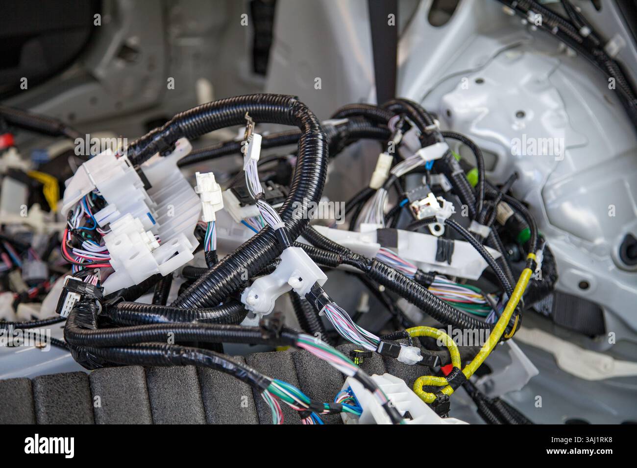 Wires, connectors, modules, and connections from a new car wiring ...