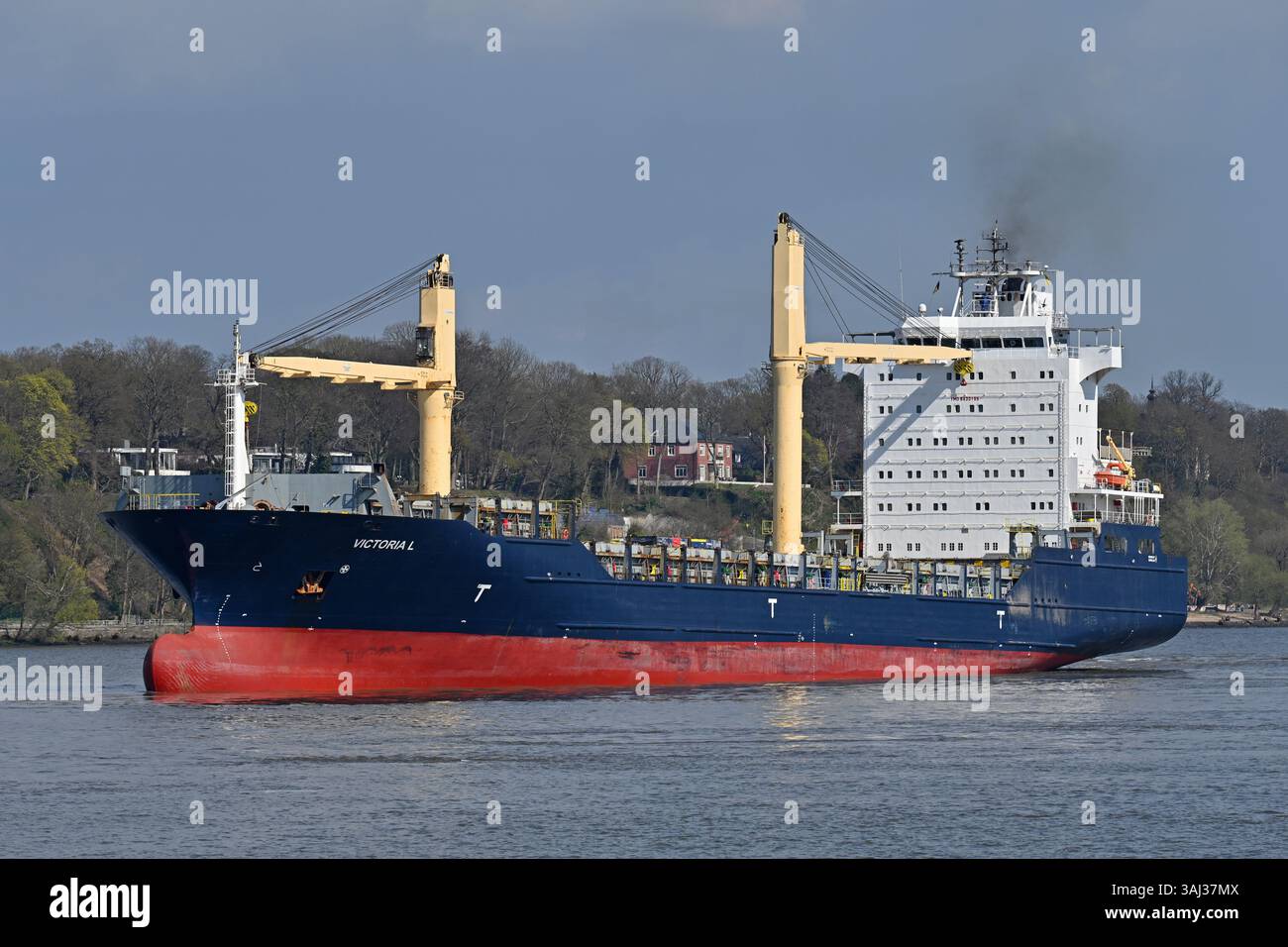 Containership VICTORIA L outbound from Hamburg. Later that night an ...