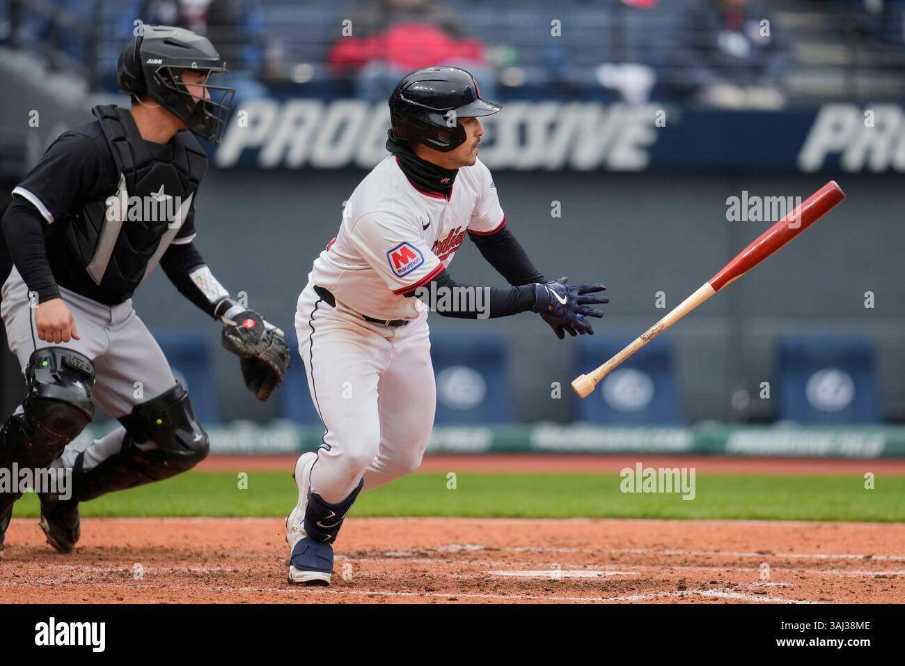 Cleveland Guardians' Steven Kwan drops his bat after hitting a single ...