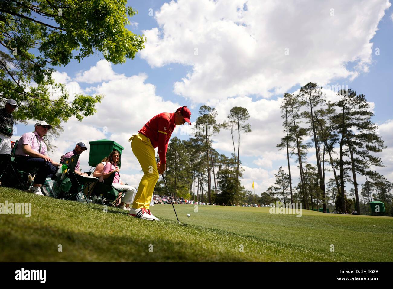 Sergio Garcia, of Spain, chips to the green on the sixth hole during ...