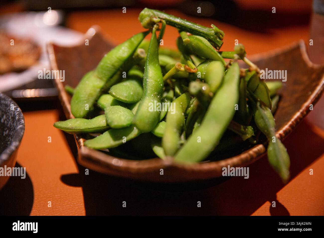 Serving of Edamame at a japanese restaurant Stock Photo - Alamy