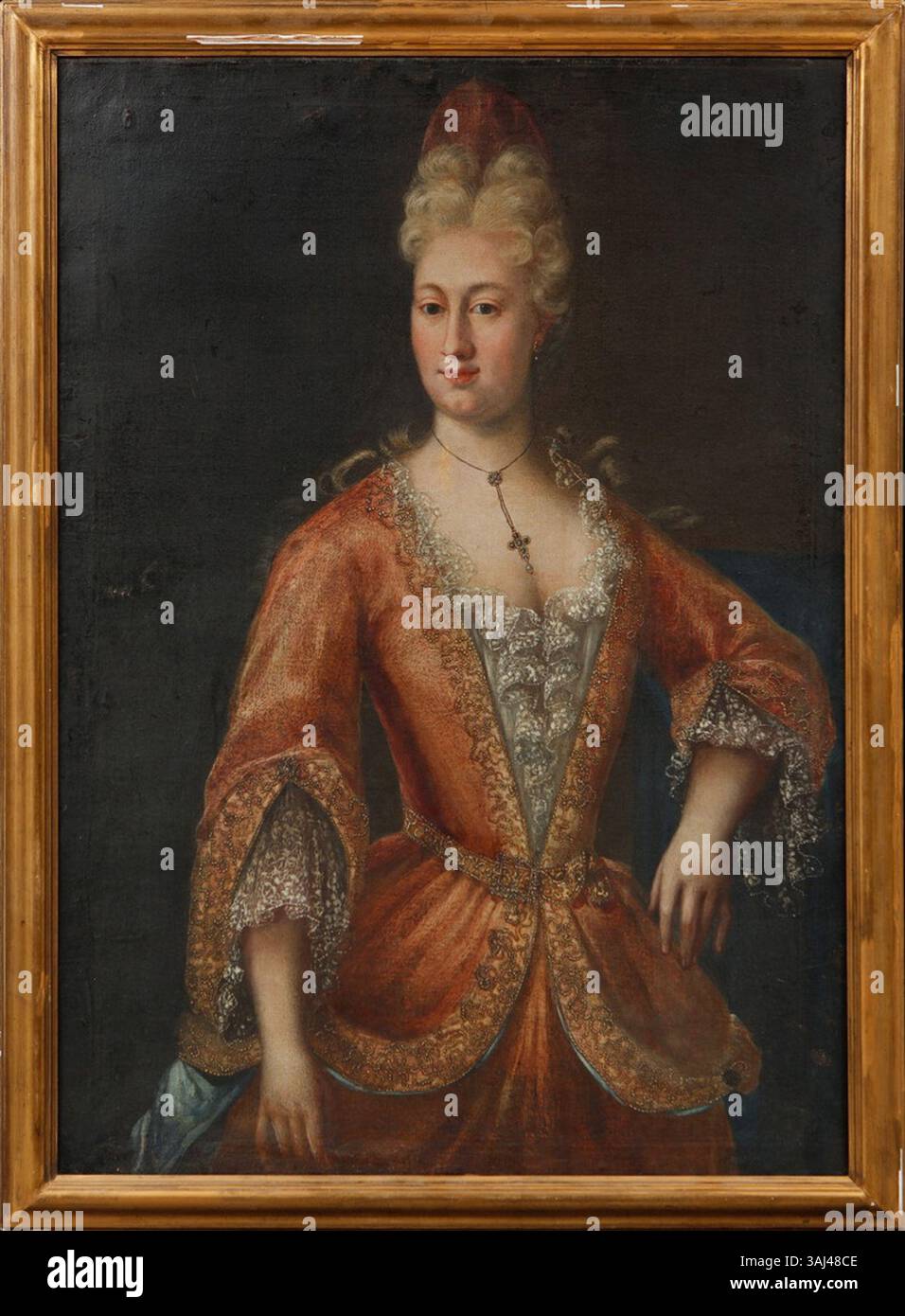 This early 18th-century portrait, painted in oil on canvas, is a ...