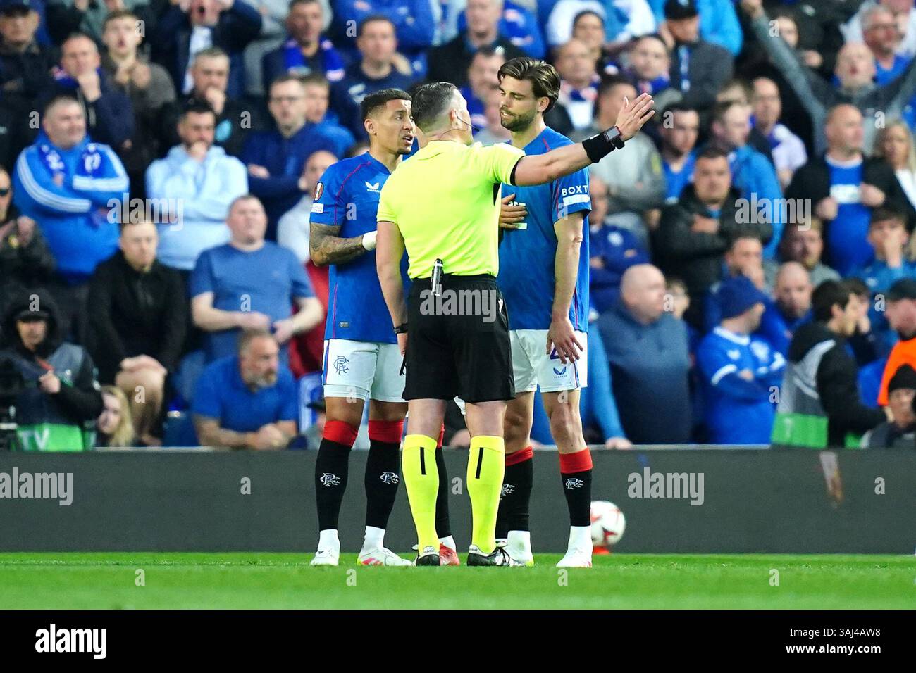 Rangers Robin Propper (right) reacts after being shown a red card by ...