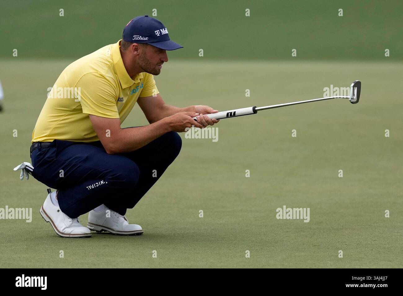 Wyndham Clark lines up a putt on the second hole during the first round ...