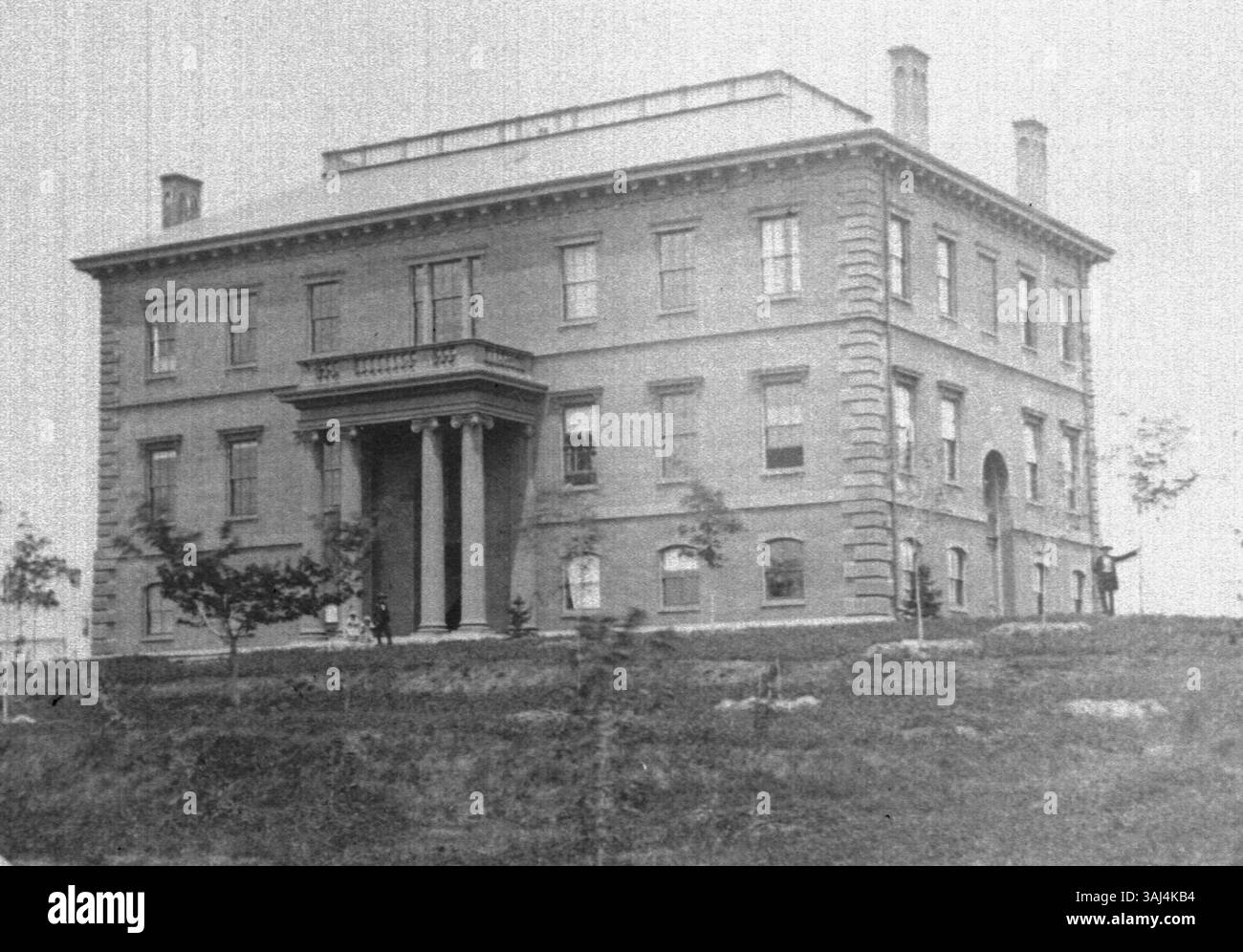 A photograph of Ballou Hall at Tufts College taken by Edwin B. Rollins ...