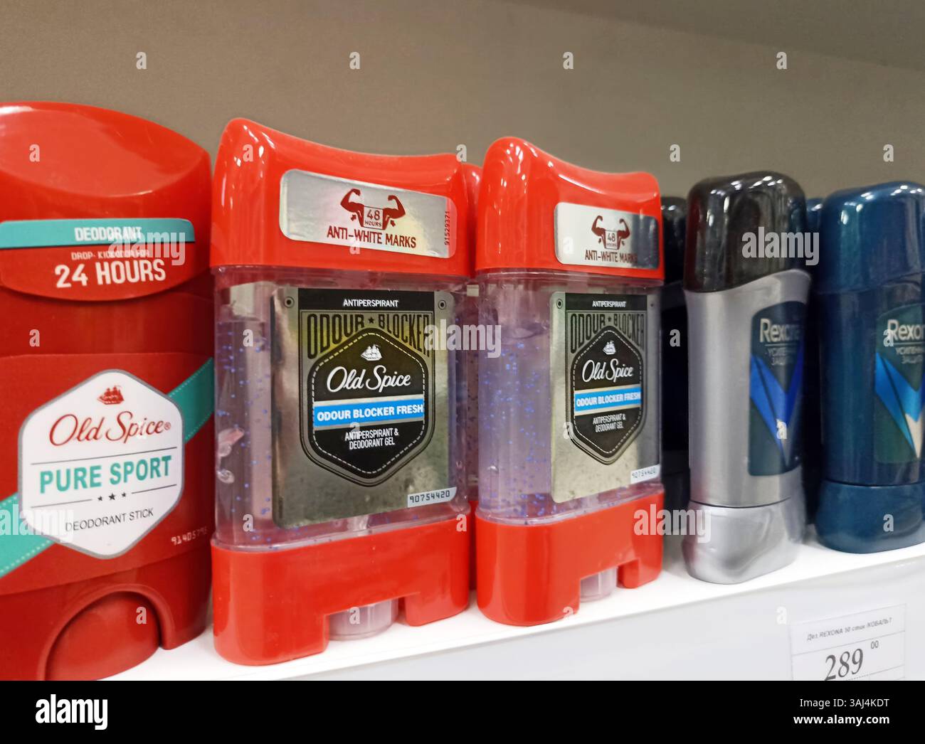 Variety of deodorant sticks on store shelf featuring old spice and ...