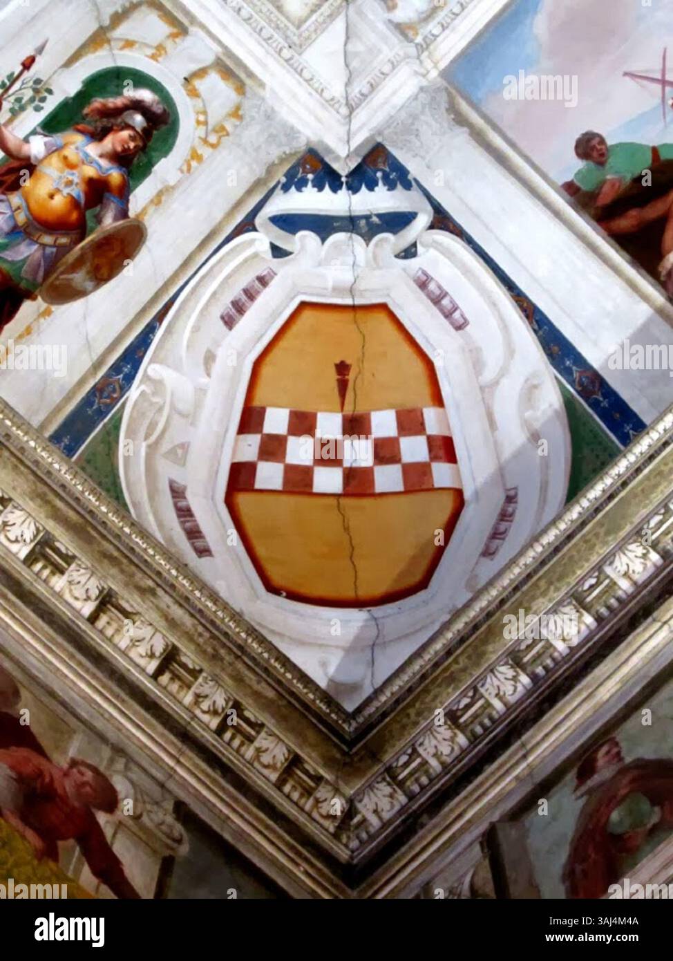A 16th-century ceiling with a coat of arms of the Spinola family, an ...