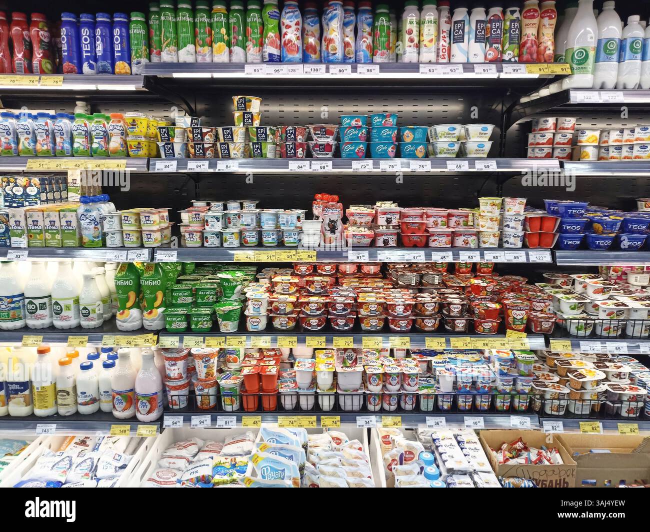 Diverse dairy products display on supermarket shelves Stock Photo - Alamy