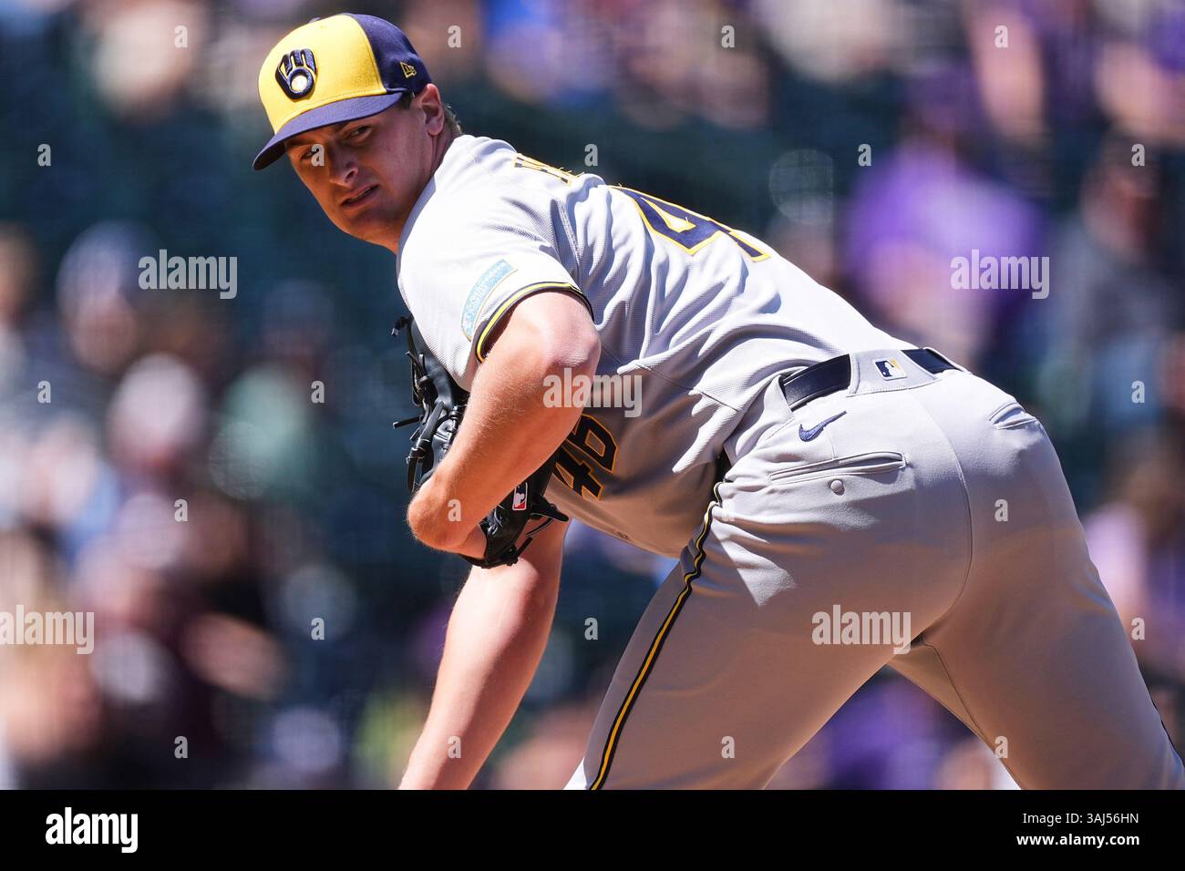 Milwaukee Brewers starting pitcher Quinn Priester checks the runner at ...