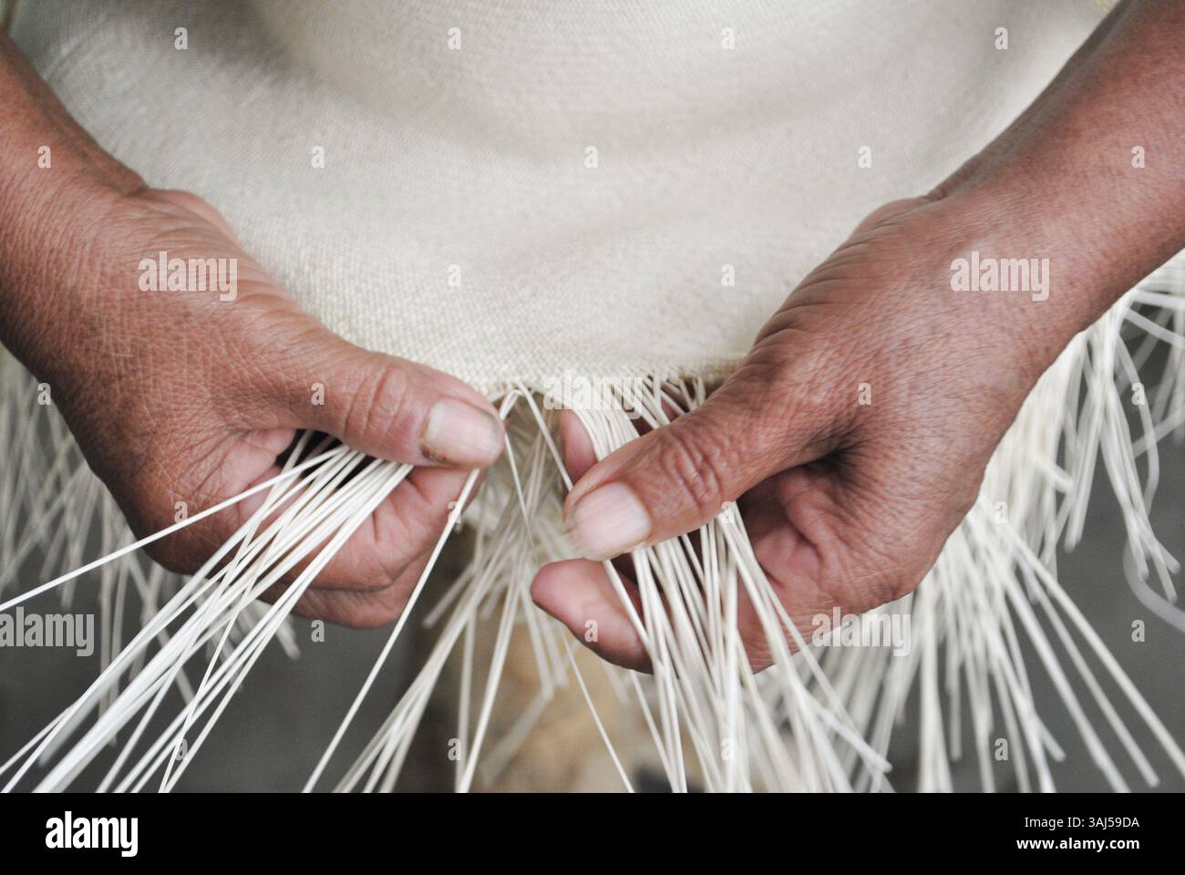 July 16, 2017 - Montecristi, Manabi, Ecuador - Weaving toquilla straw ...
