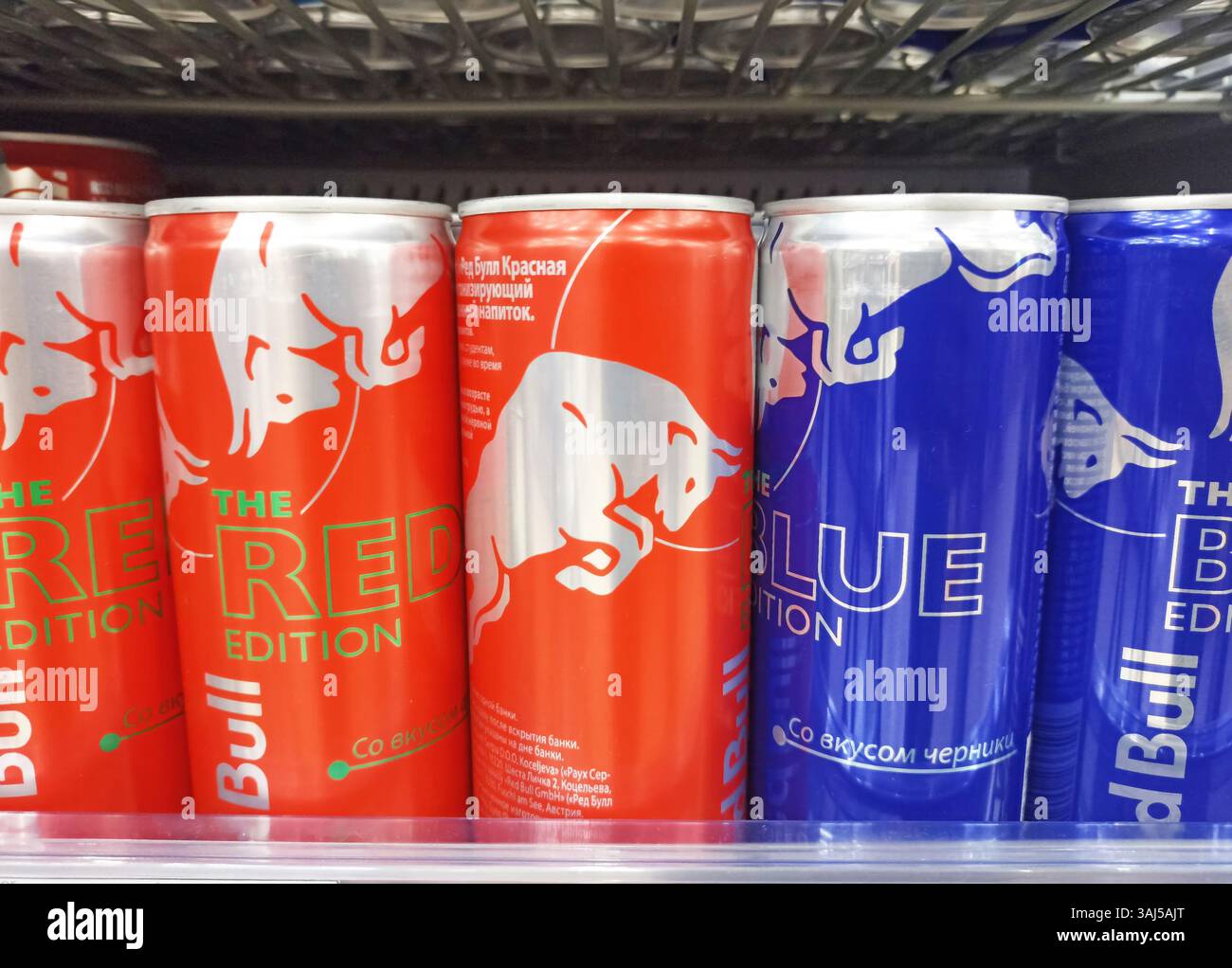Red bull edition cans on shelf: blueberry and cranberry flavors Stock ...