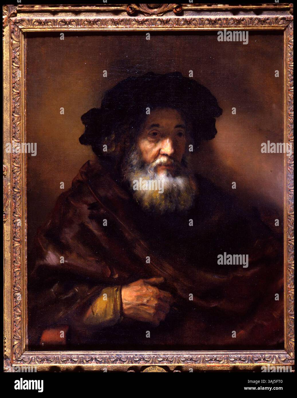 This 1650s portrait, attributed to a follower of Rembrandt, features an ...