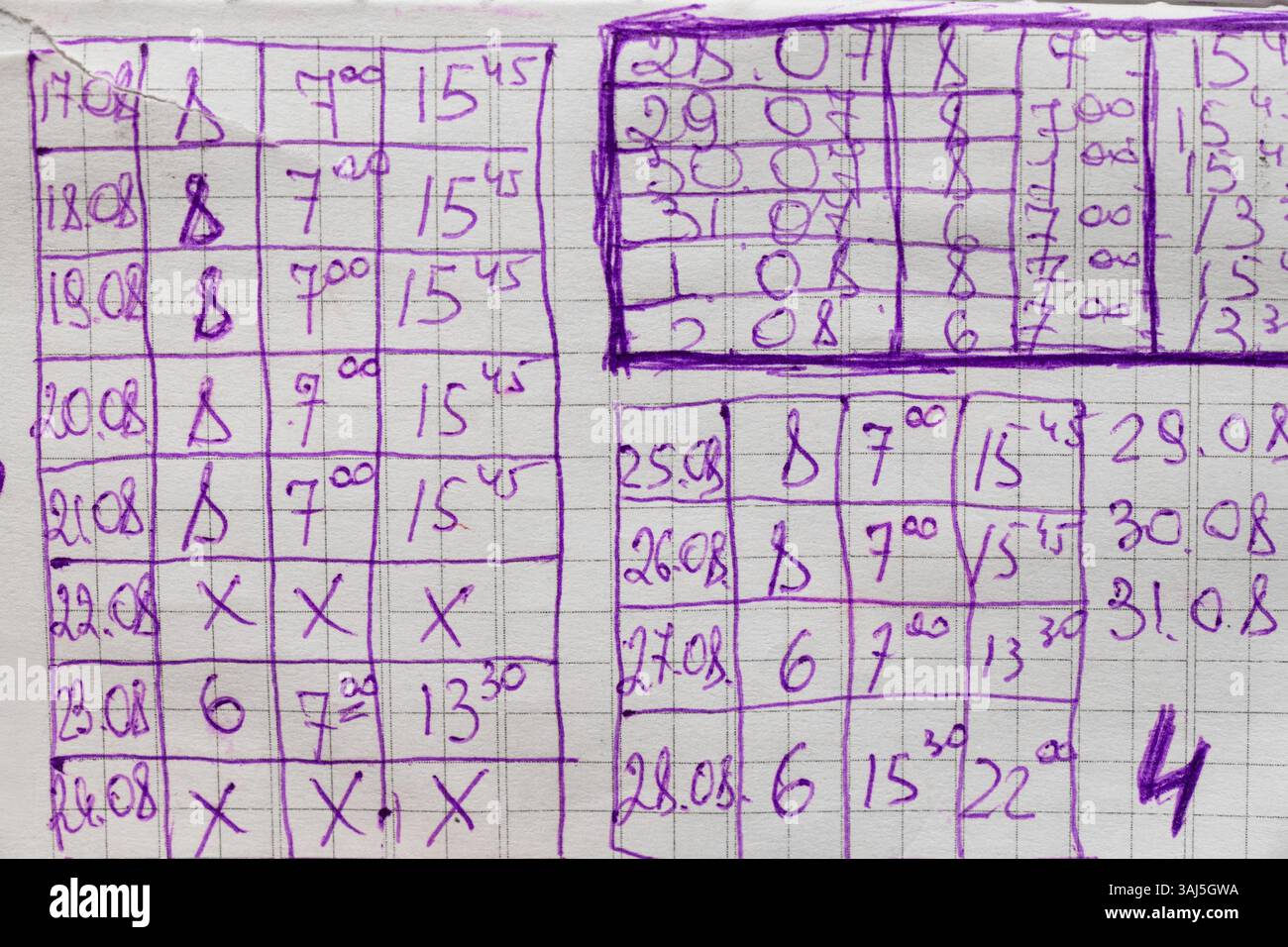 Table with work schedule written by hand in a notebook, work time table ...