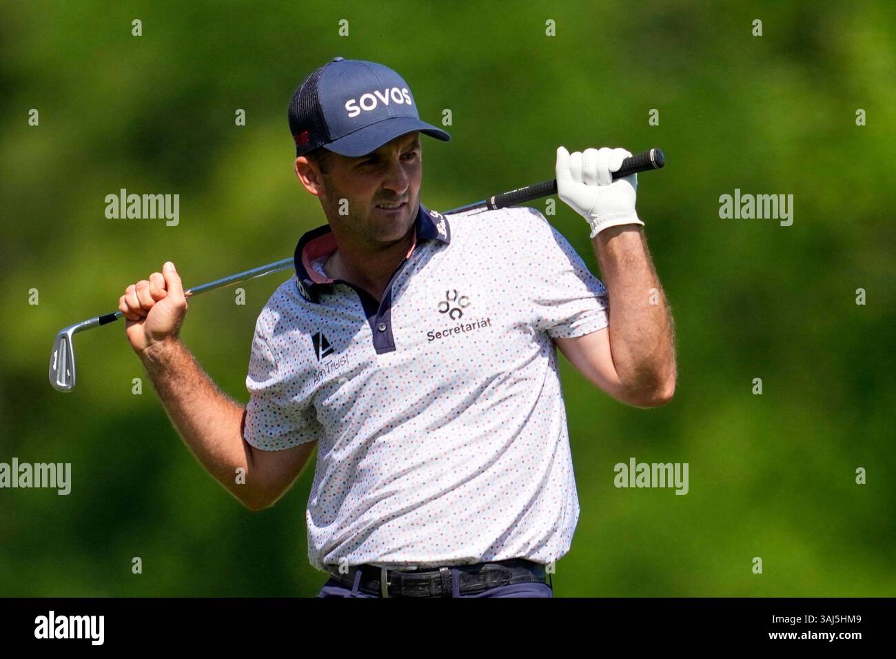 Denny McCarthy watches his tee shot on the 12th hole during the first ...