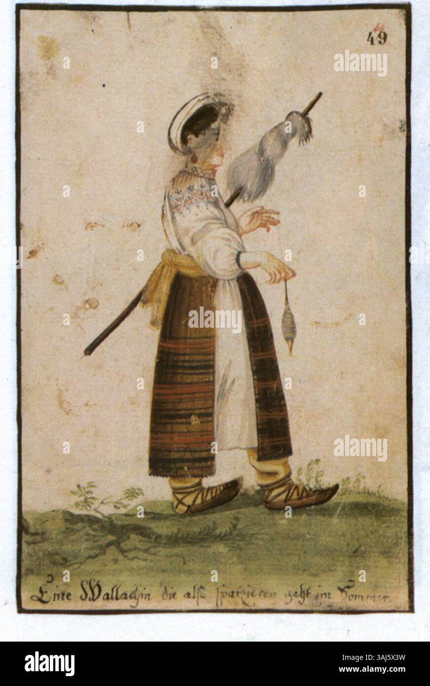 The 18th-century costume of a Roumanian woman with a spindle, depicting ...