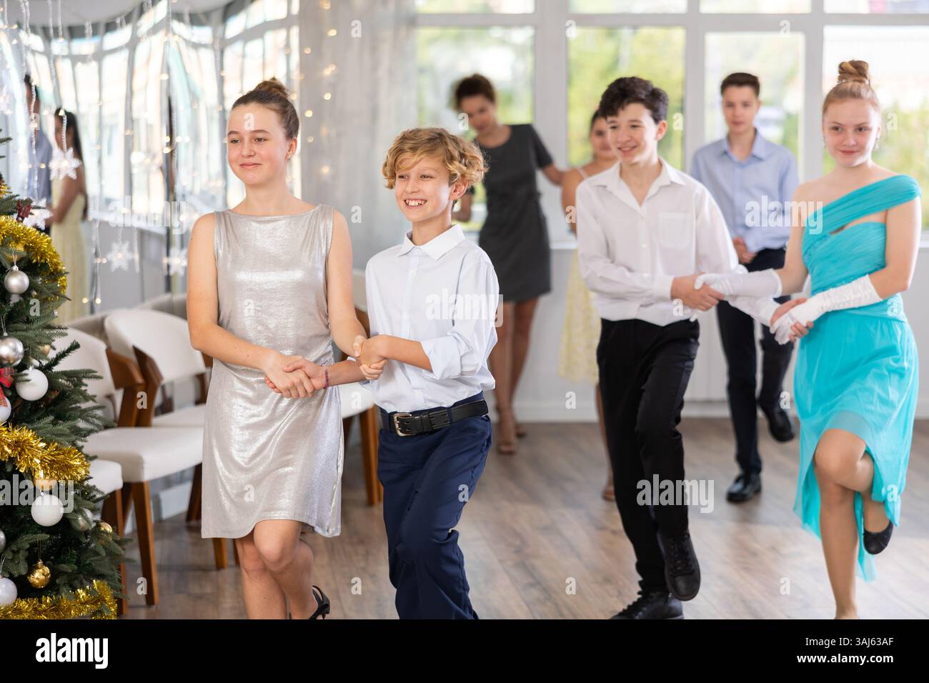Boys and girls dancing folk dances in studio Stock Photo - Alamy