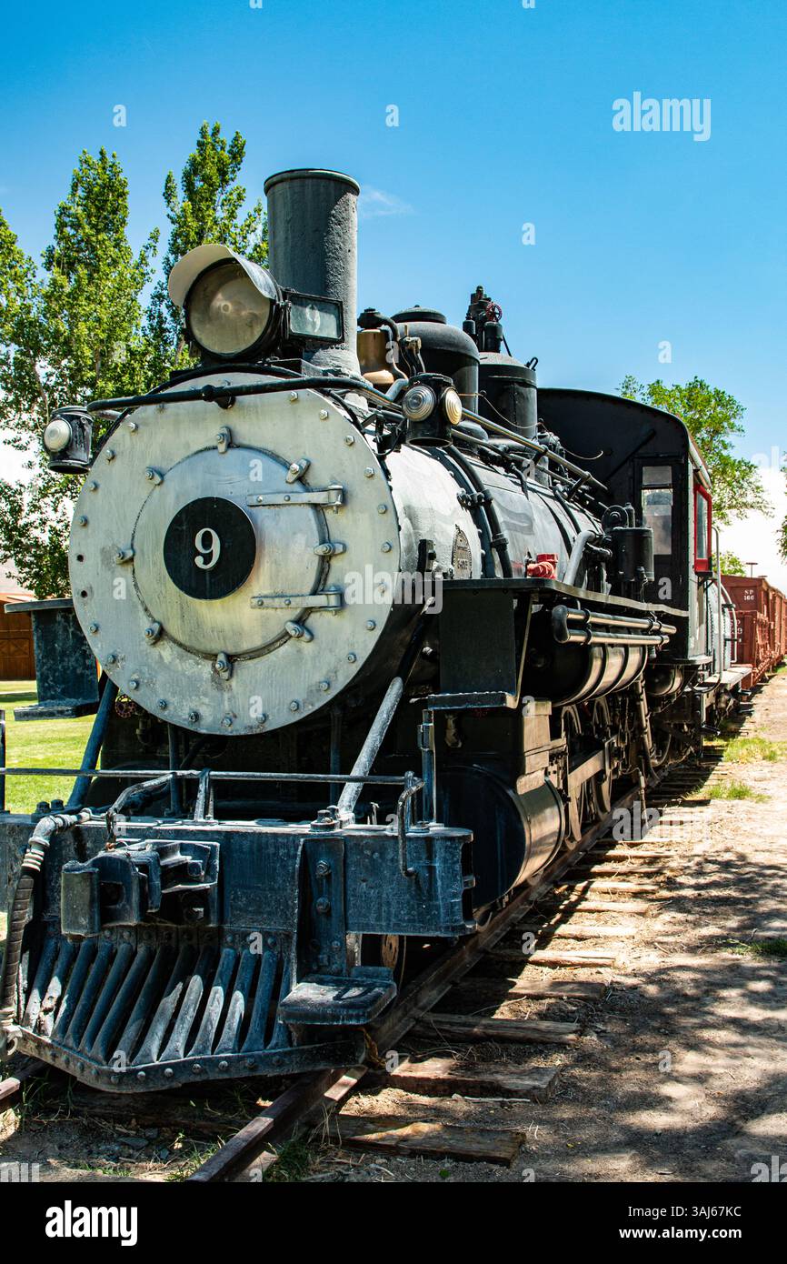 A vintage historical steam engine locomotive on display in Bishop, CA ...
