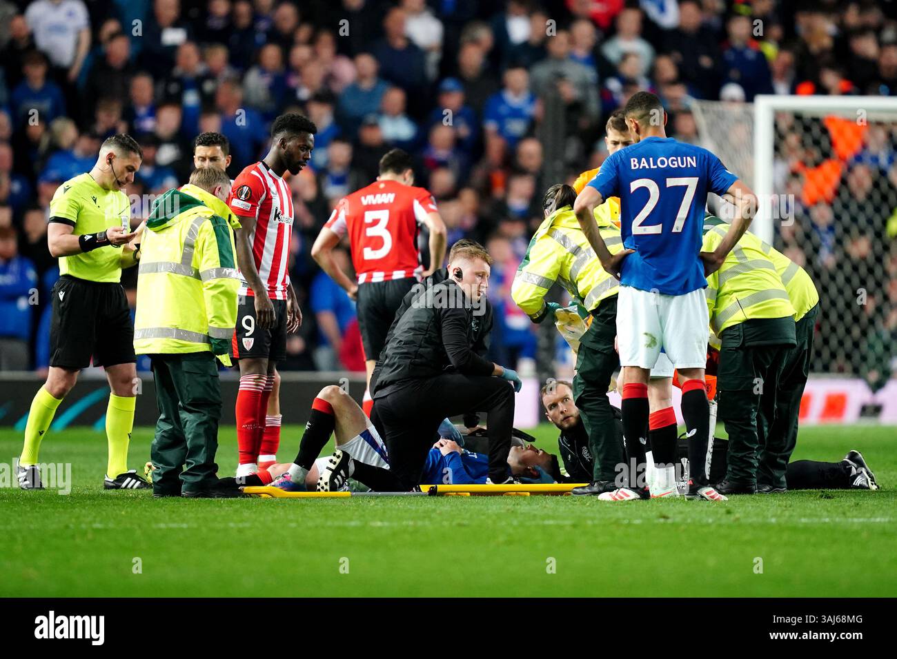 Rangers' Bailey Rice receives treatment following an injury during the ...