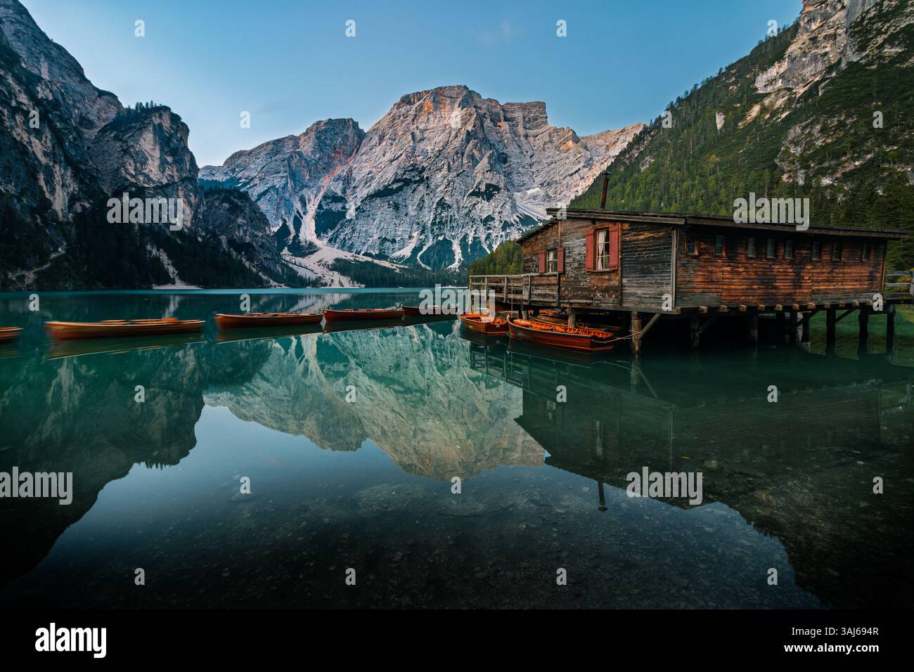 lago di braies lake prags with the famous wooden fisher hut in the ...
