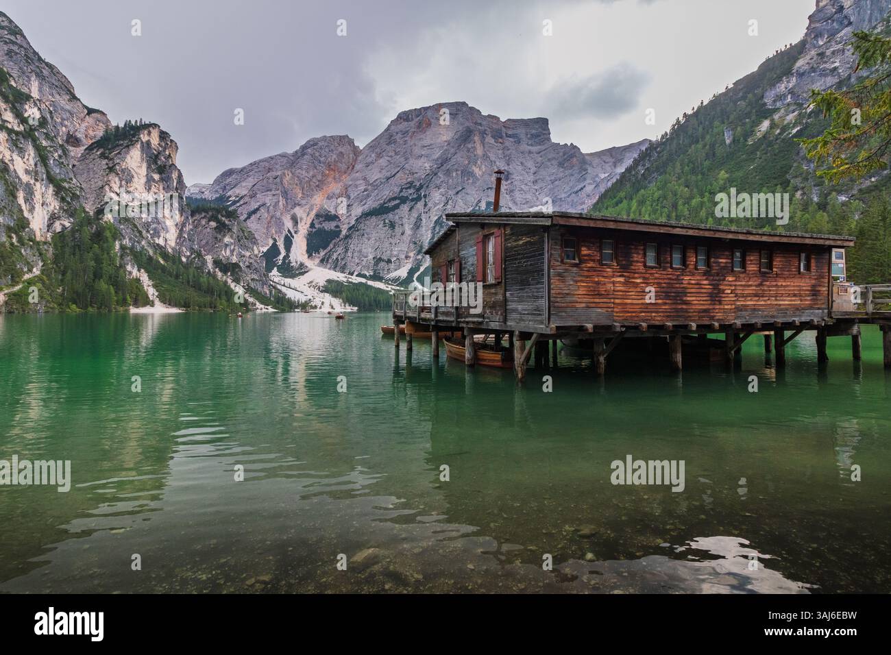 lago di braies lake prags with the famous wooden fisher hut in the ...