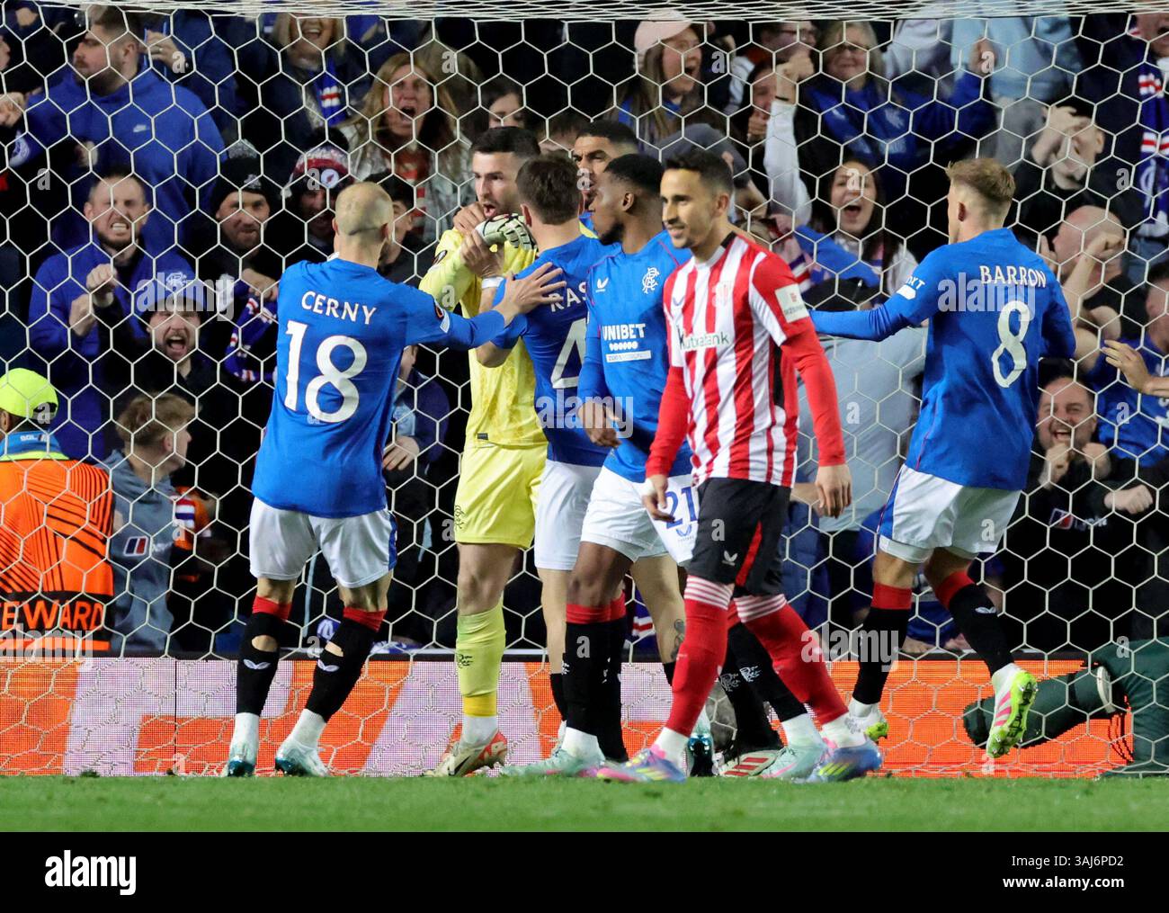 Rangers goalkeeper Liam Kelly celebrates saving a penalty during the ...