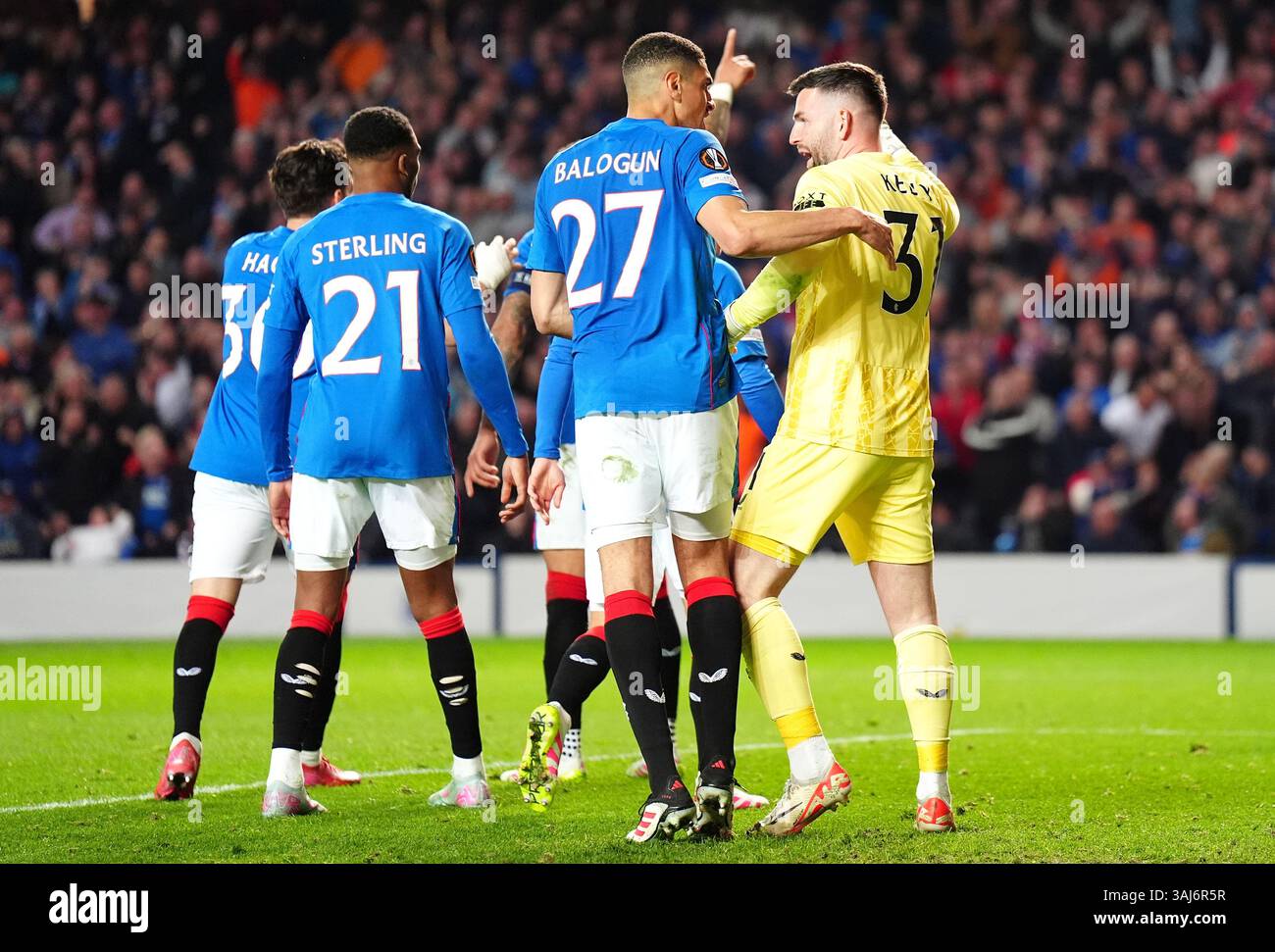 Rangers goalkeeper Liam Kelly (right) celebrates with team-mates after ...