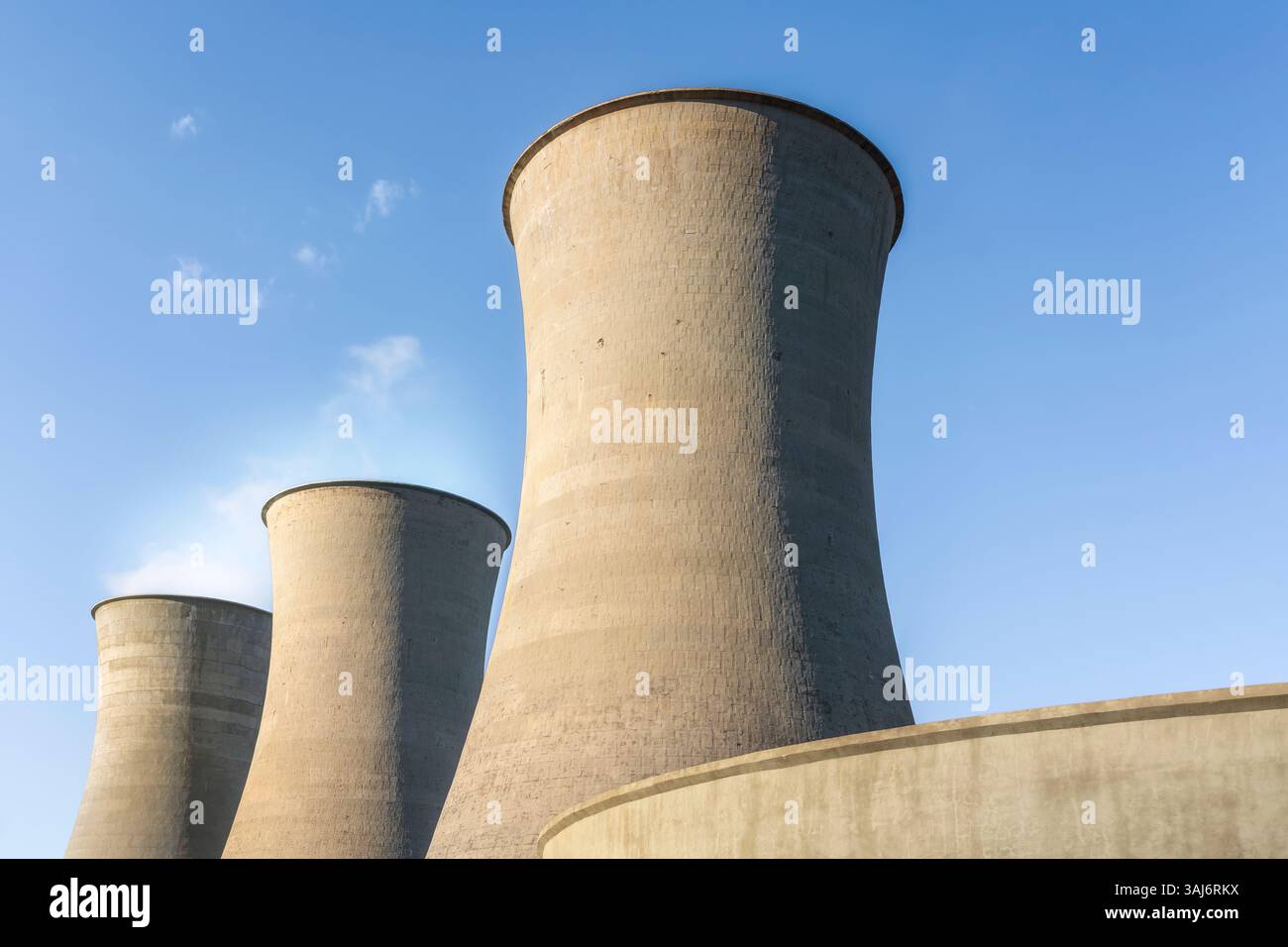 Cooling towers in geothermal power plant at sunset. Larderello, Tuscany ...