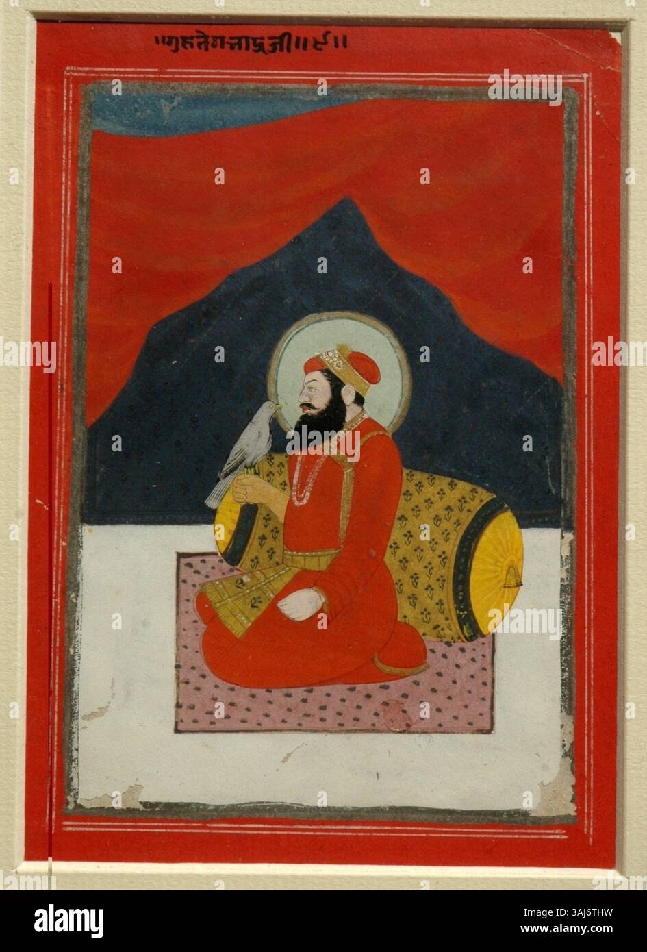 This 19th-century portrait depicts Guru Tegh Bahadur, the ninth Guru of the Sikhs, known for his ...