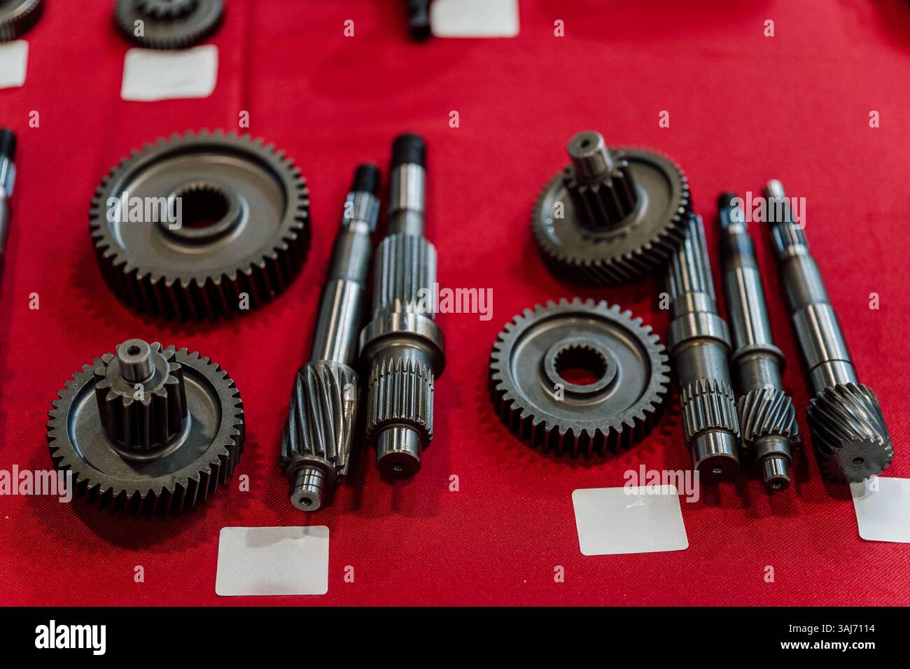 gears on fabric in the store. spare parts for repairing wheels on a ...