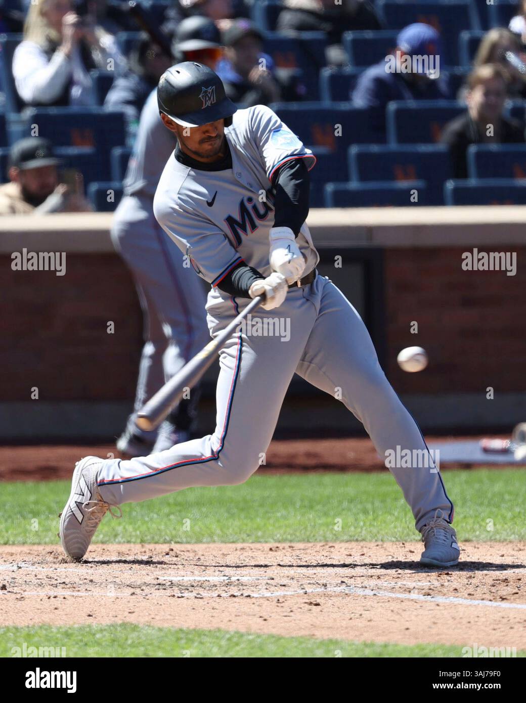 Miami Marlins' Dane Myers hits the ball during the third inning of a ...