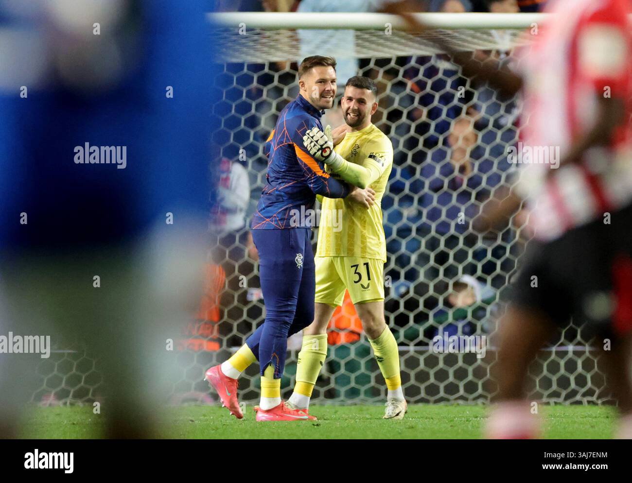 Rangers goalkeeper Liam Kelly (right) celebartes with goalkeeper Jack ...