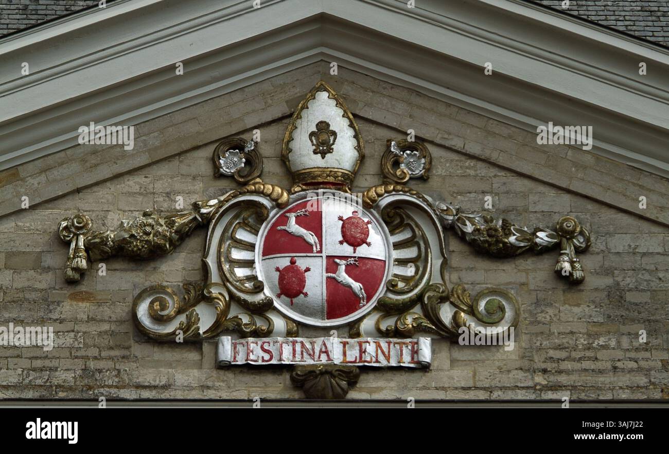 This 18th-century carving by Willem Ignatius Kerricx shows the coat of ...