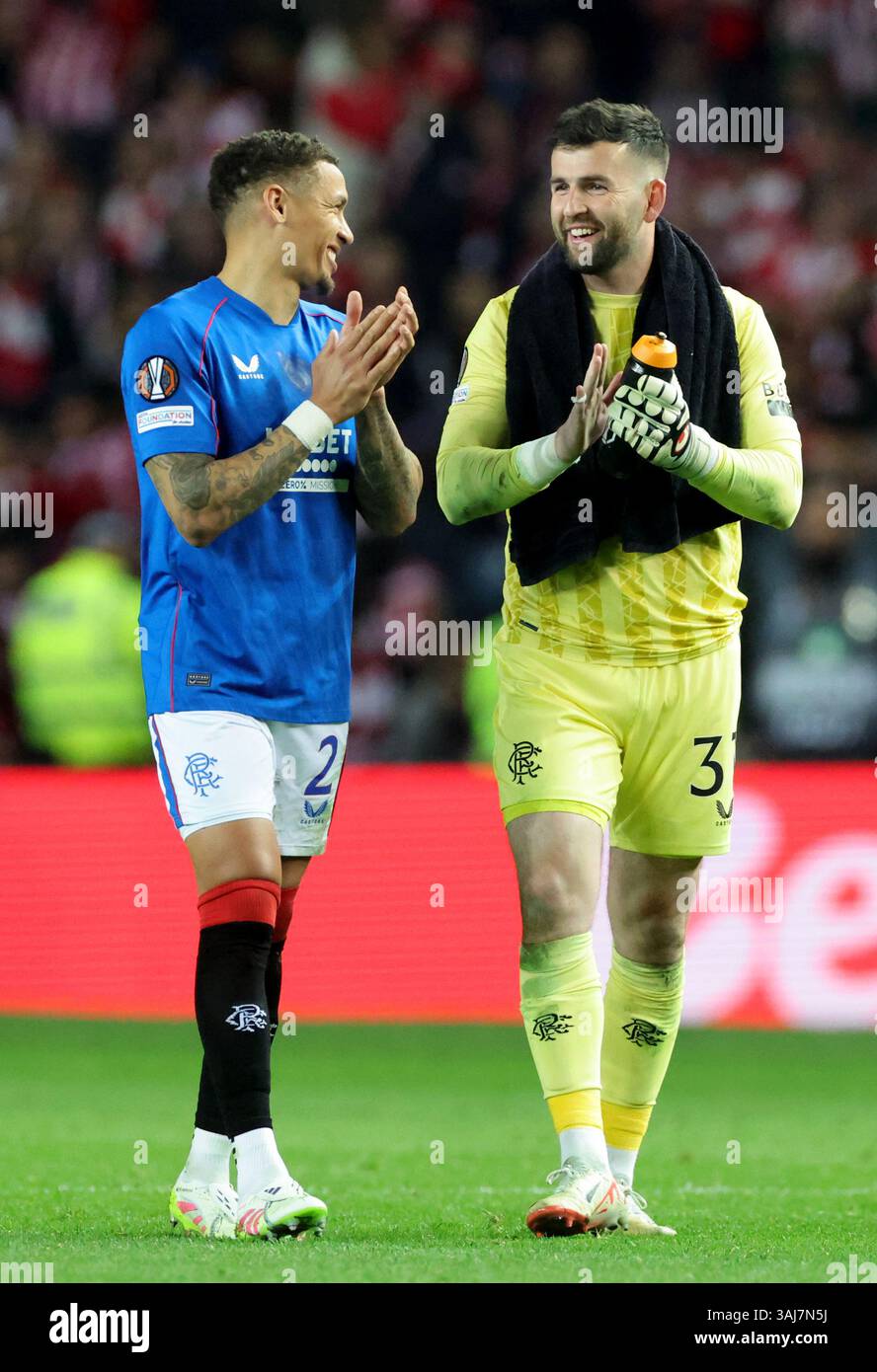 Rangers' James Tavernier (left) and Rangers goalkeeper Liam Kelly ...