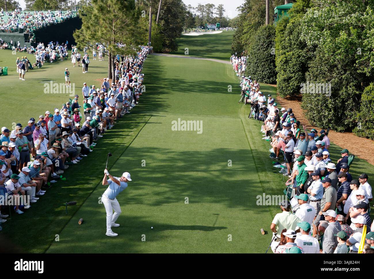 Justin Rose of England tees off on the 18th hole during the first round ...