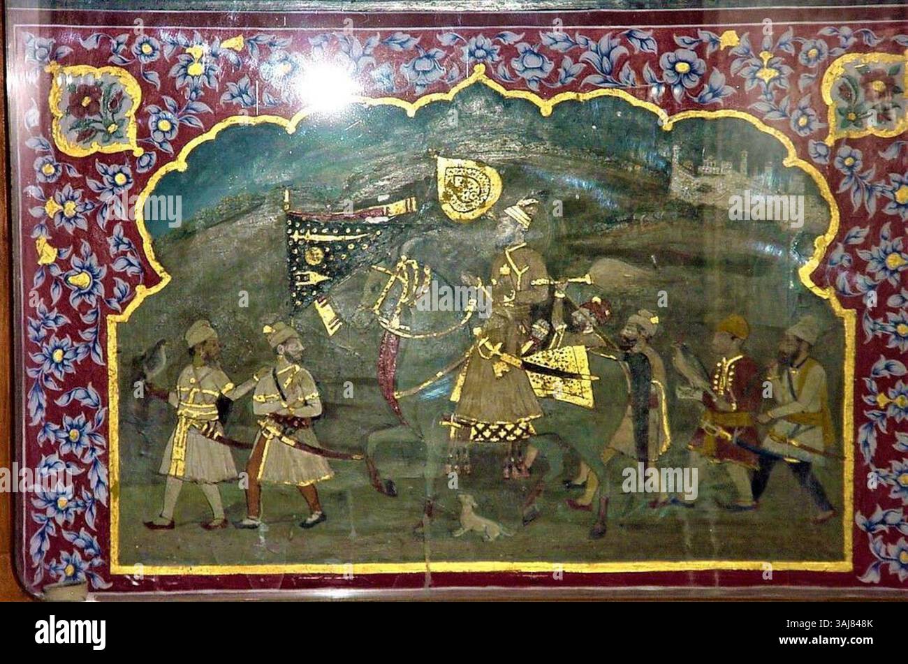 This early 19th-century mural, attributed to a Kangra artist, depicts Guru Gobind Singh on ...