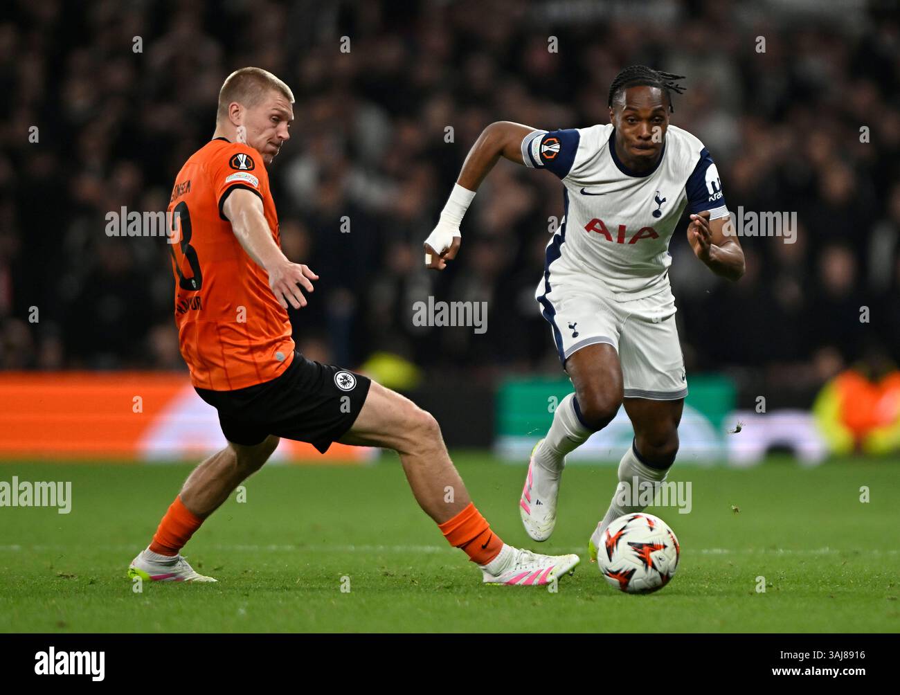 London, UK. 10th Apr, 2025. Mathys Tel (Spurs) goes past Rasmus ...
