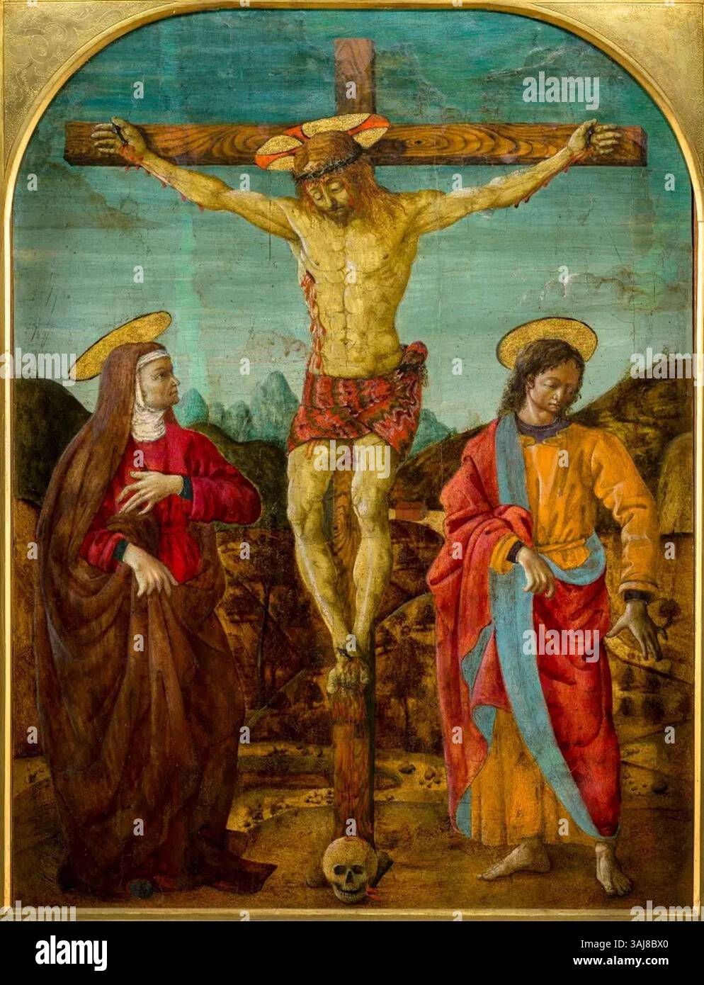This tempera and gilding painting by a follower of Andrea del Castagno depicts the Crucifixion ...