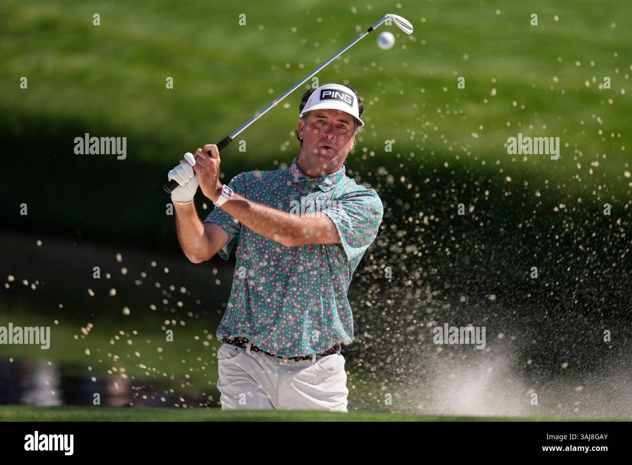 Bubba Watson hits from the bunker on the 16th hole during the first ...