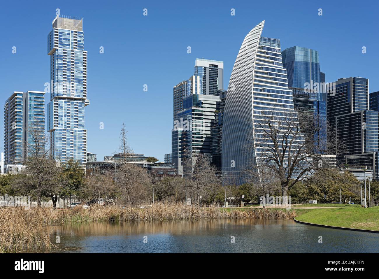 Downtown Austin skyline seen from Butler Metro Park featuring Lady Bird ...
