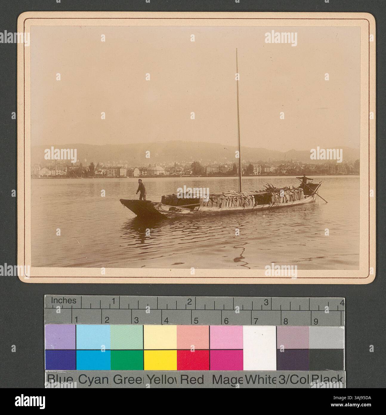 This 1896 photograph by Robert Breitinger shows a lading ship ...